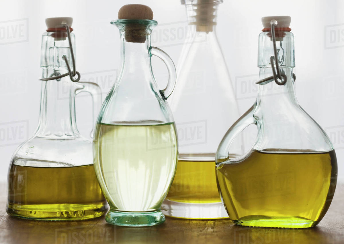 Assorted bottles of oil - Royalty-free Stock Photo | Dissolve