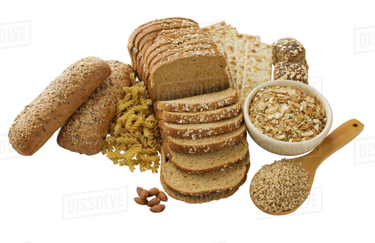 Close up of assorted grains and bread - Royalty-free Stock Photo | Dissolve