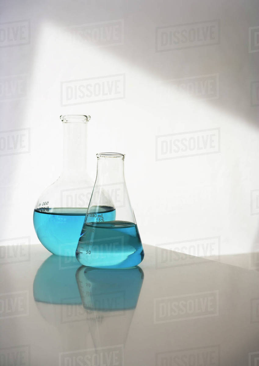 Two beakers with liquid - Royalty-free Stock Photo | Dissolve