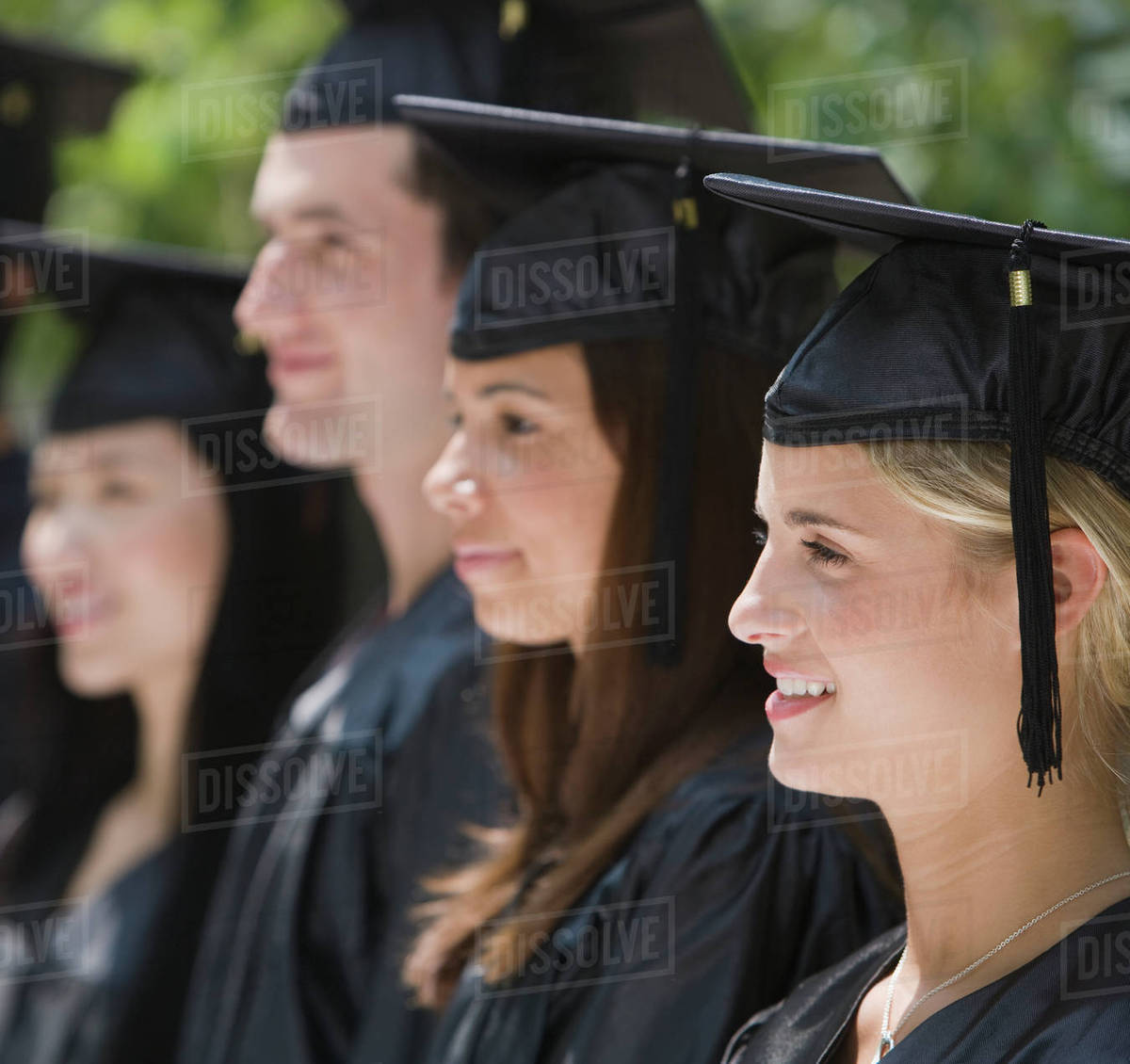 Group of college graduates in row - Royalty-free Stock Photo | Dissolve