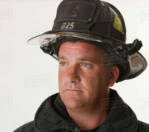 Close up of male firefighter - Royalty-free Stock Photo | Dissolve