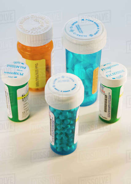 Close up of medication bottles - Royalty-free Stock Photo | Dissolve