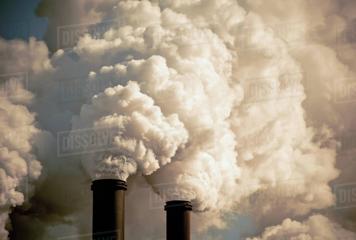 Industrial smokestacks - Royalty-free Stock Photo | Dissolve