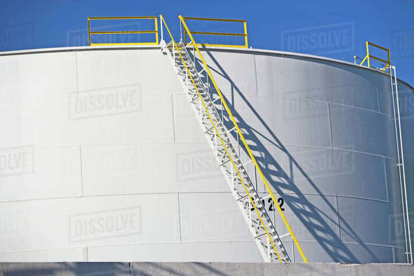 Ladder on cylindrical container - Royalty-free Stock Photo | Dissolve