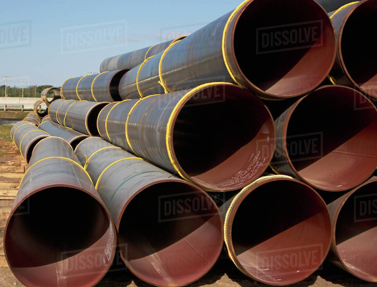Stack of large pipes - Royalty-free Stock Photo | Dissolve