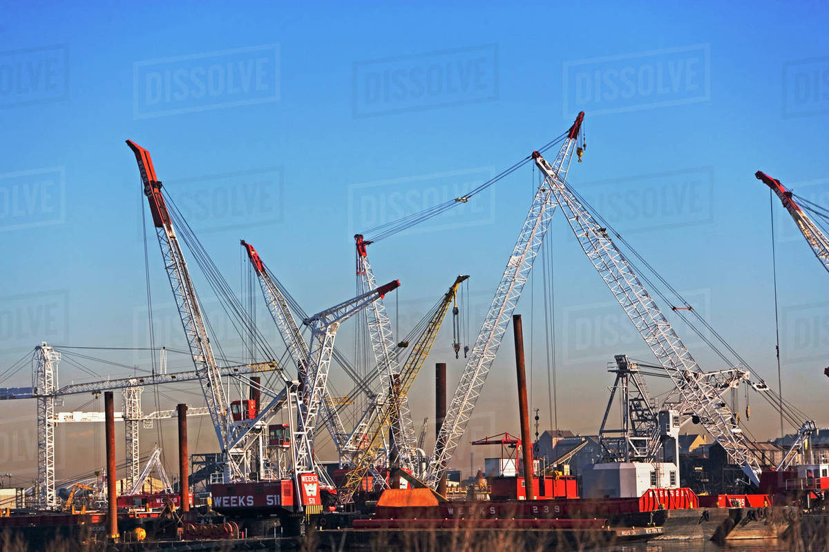 Cranes on dock - Royalty-free Stock Photo | Dissolve