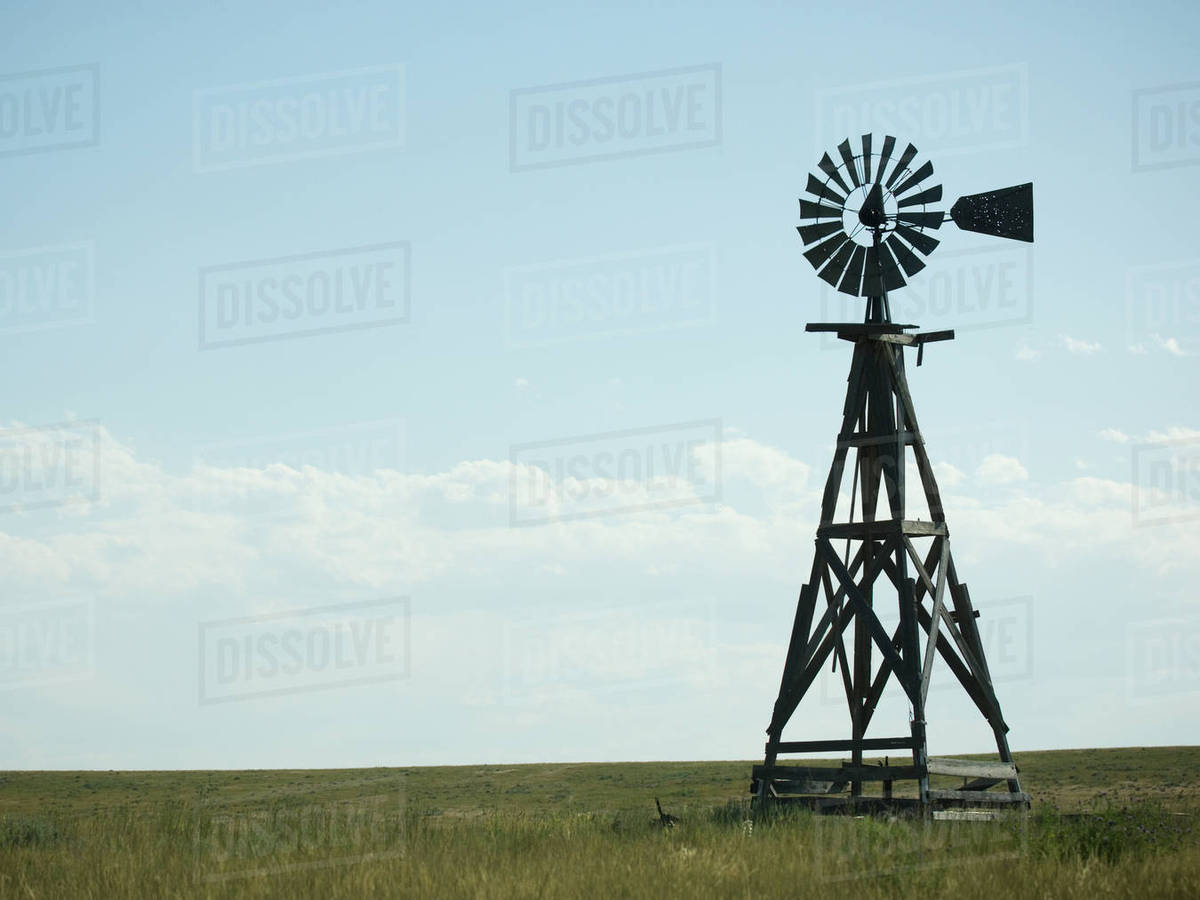 Windmill in field - Royalty-free Stock Photo | Dissolve