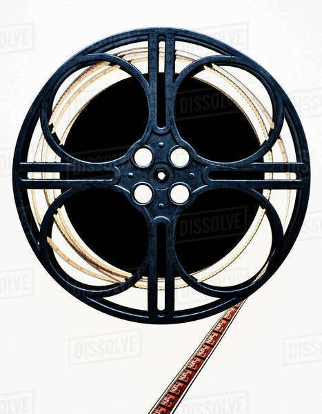 Film reel on white background - Stock Photo - Dissolve