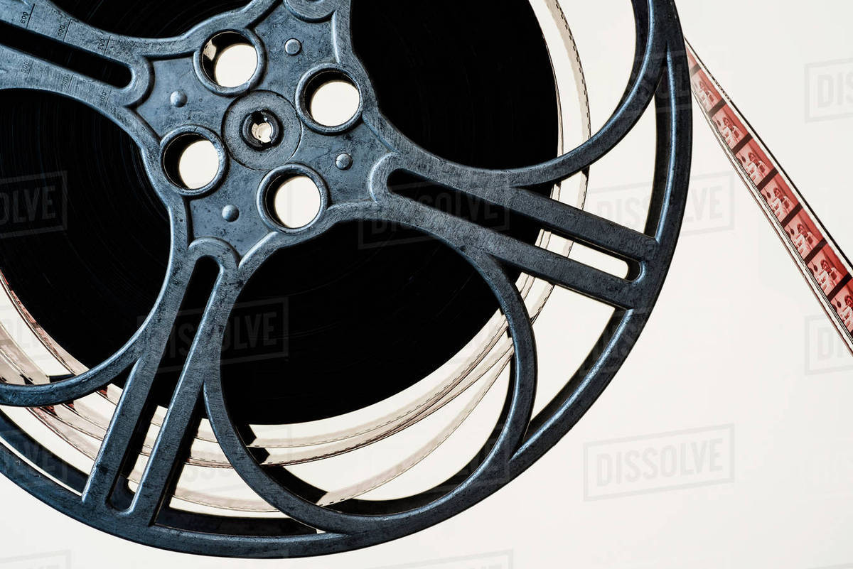 Film reel on white background - Stock Photo - Dissolve