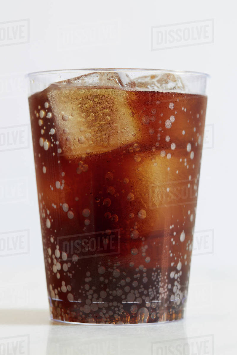 Studio shot of cold drink with ice cubes on white background - Stock ...