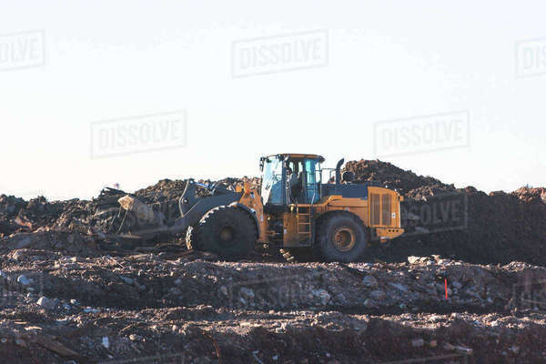 USA, New York State, New York City, Bulldozer on garbage dump - Royalty ...