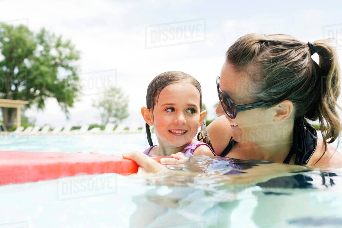 Mother with daughter (4-5) in swimming pool - Royalty-free Stock Photo ...