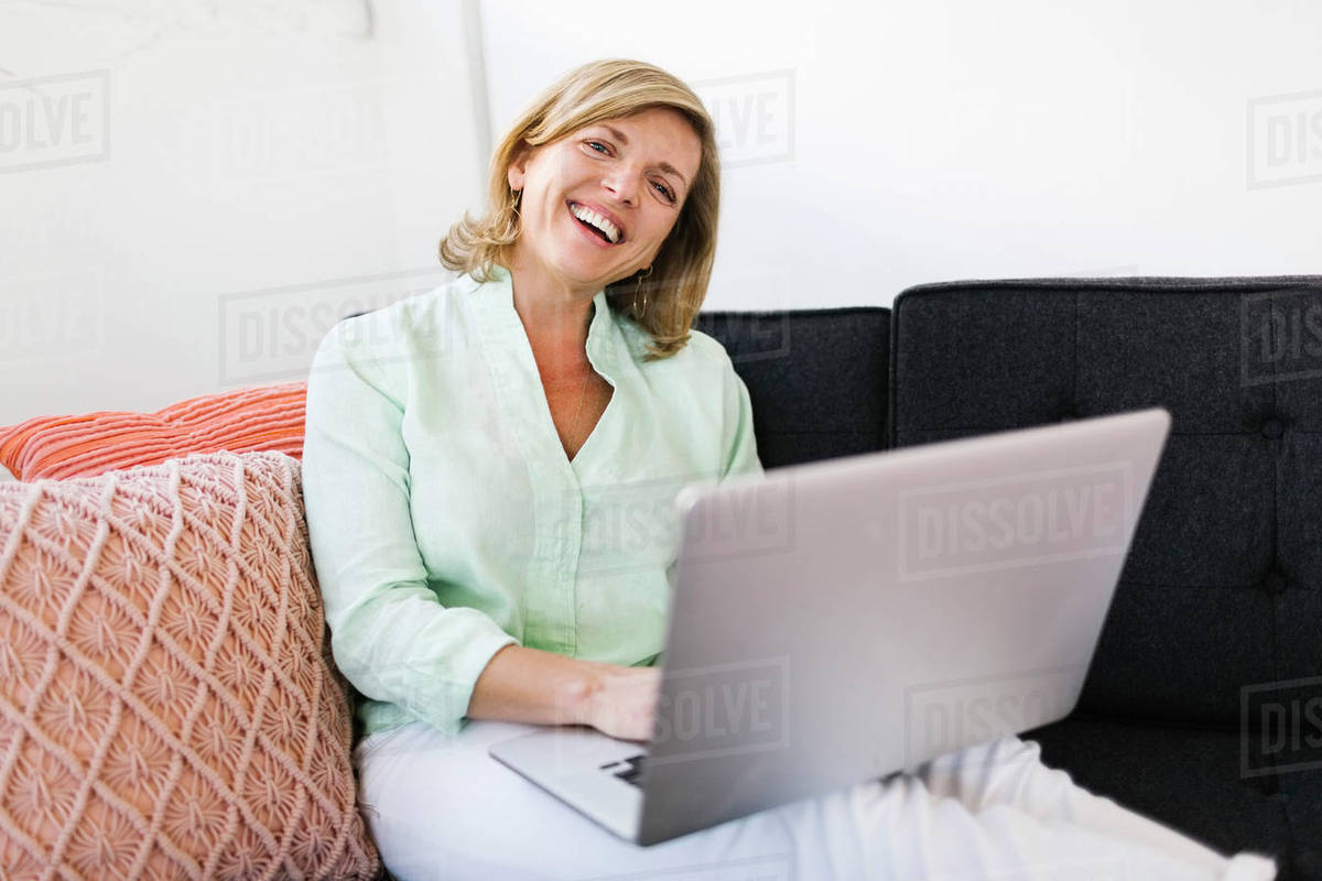 Portrait of Mature woman using computer - Royalty-free Stock Photo ...