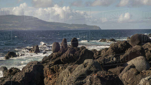 Standing stones on the lava rocks in the Pico Island in Azores ...