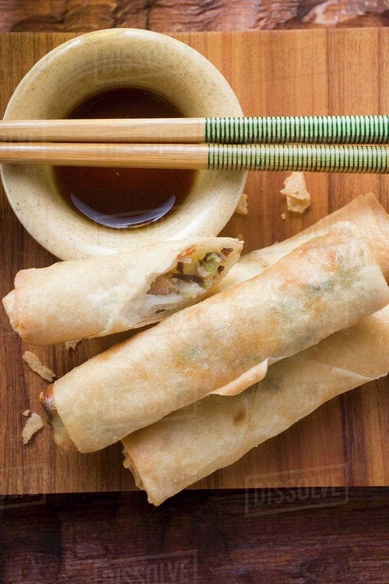 Spring rolls with soy sauce (Thailand) - Stock Photo - Dissolve