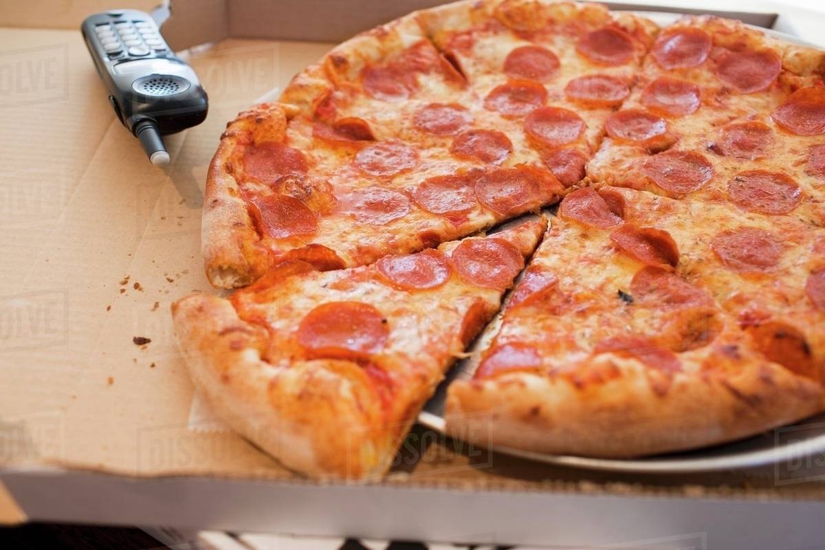 Pepperoni pizza in pizza box - Stock Photo - Dissolve