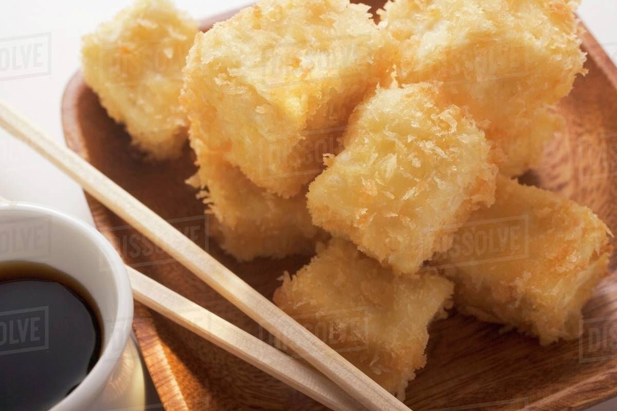 Breaded tofu cubes with soy sauce (Asia) - Royalty-free Stock Photo ...