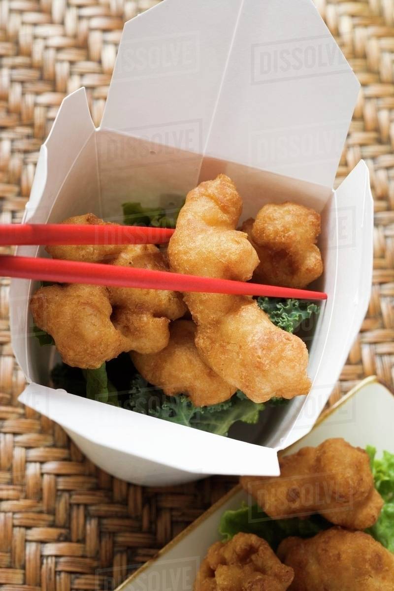 Asian chicken nuggets to take away - Stock Photo - Dissolve