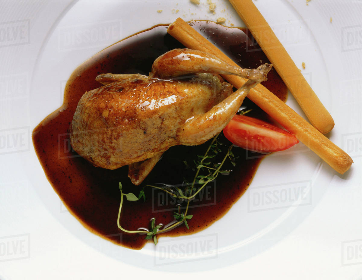 Quail with balsamic sauce & breadsticks - Royalty-free Stock Photo ...