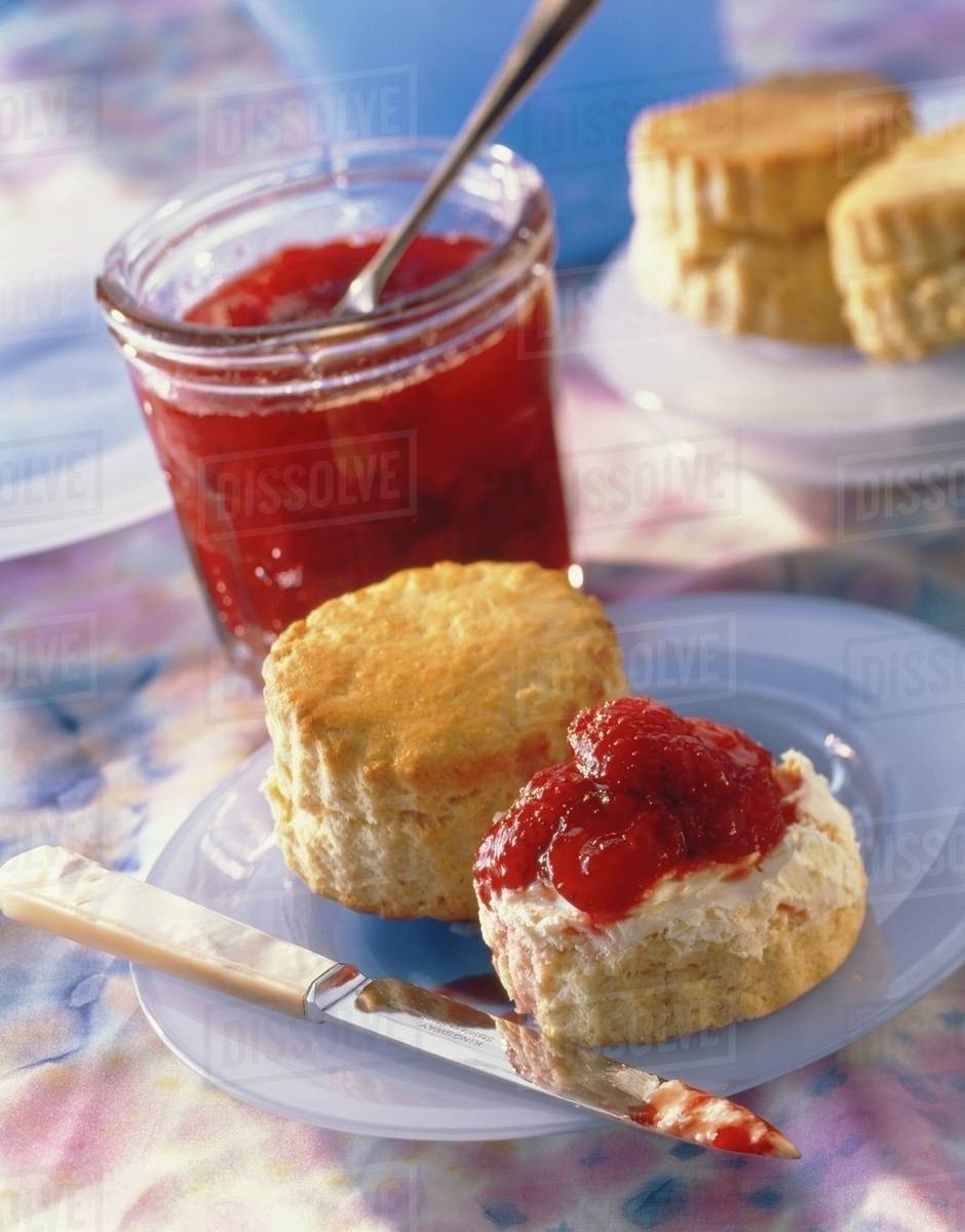 Scones with clotted cream and strawberry jam - Royalty-free Stock Photo ...