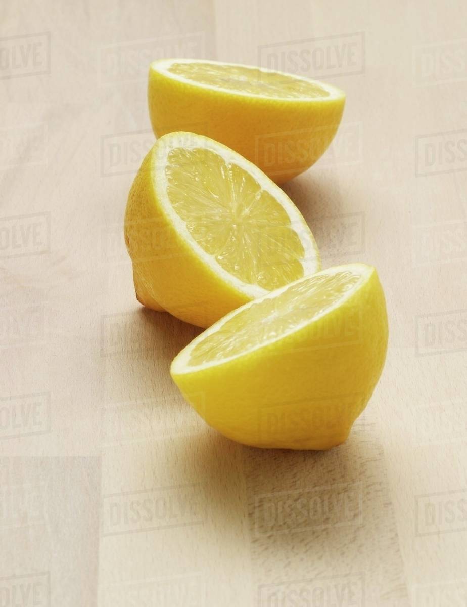 Three lemon halves - Royalty-free Stock Photo | Dissolve
