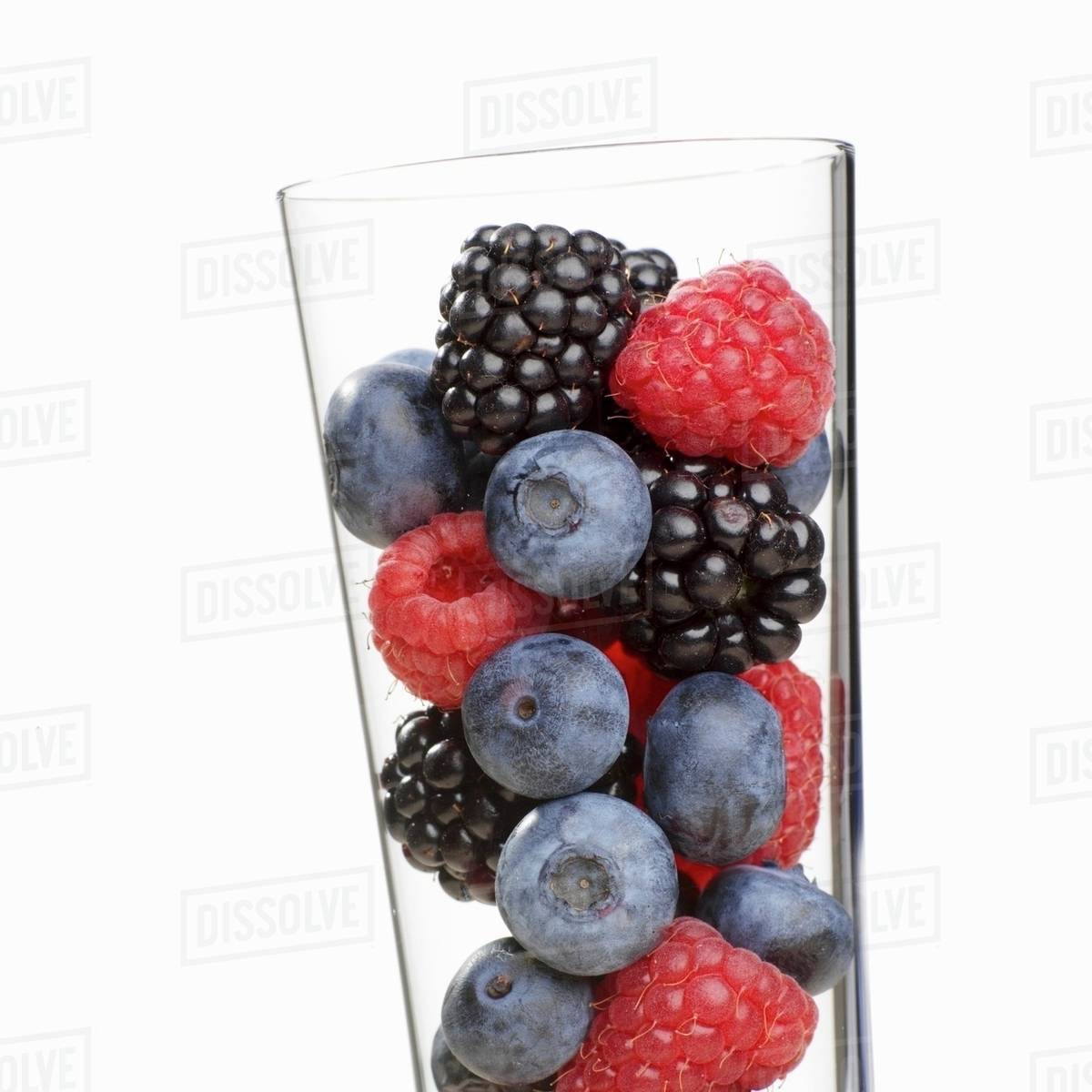 Various berries in a glass - Royalty-free Stock Photo | Dissolve