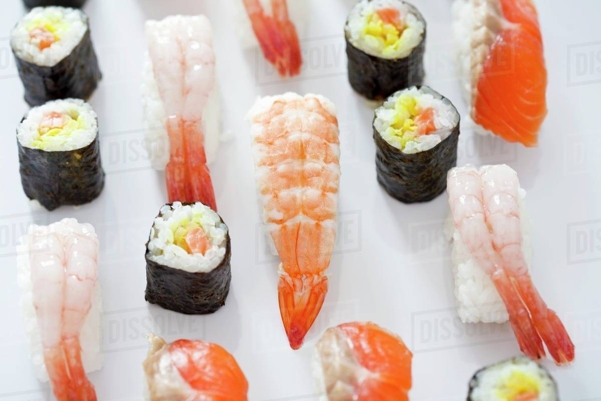 Various types of nigiri and maki sushi - Stock Photo - Dissolve