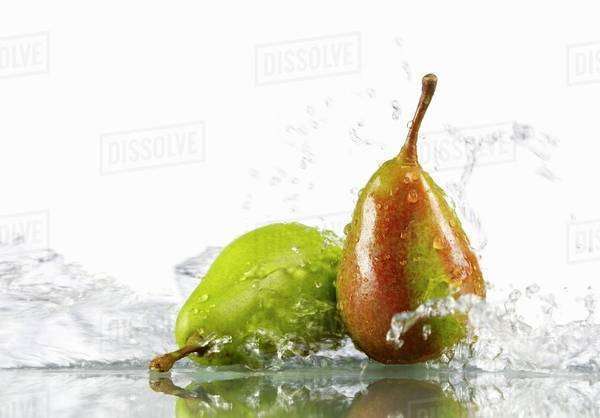 Two pears in water - Royalty-free Stock Photo | Dissolve