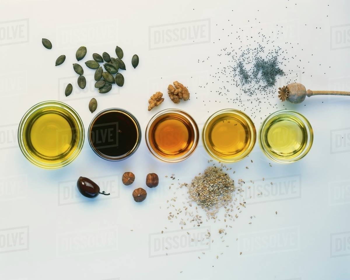 Various types of oil with the raw ingredients - Royalty-free Stock ...
