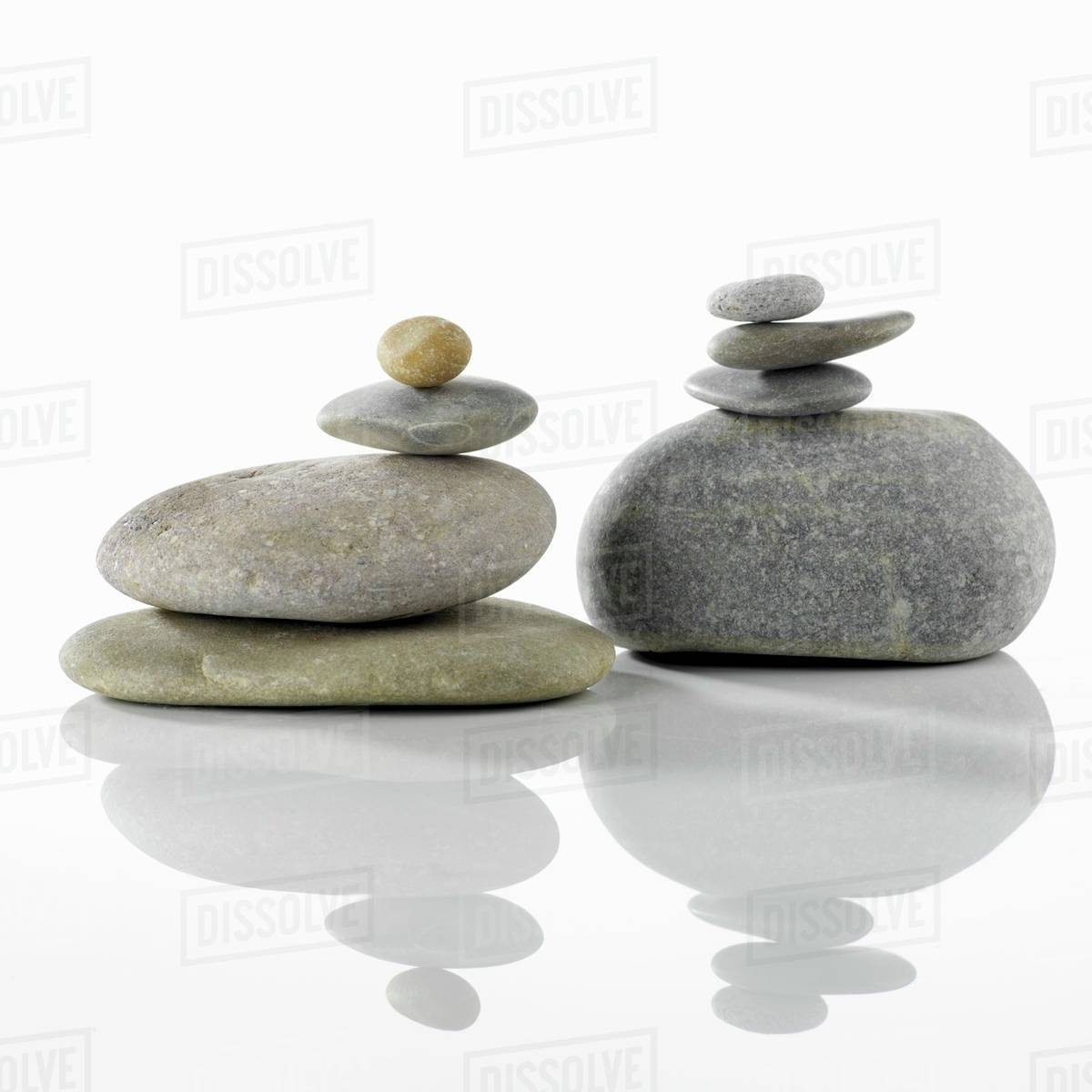 Stacks of assorted pebbles - Royalty-free Stock Photo | Dissolve