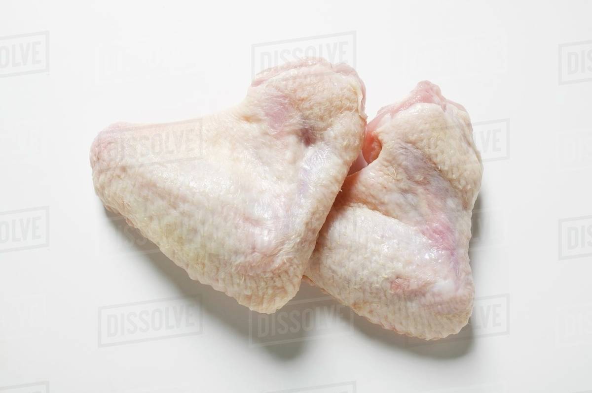Two chicken wings - Royalty-free Stock Photo | Dissolve