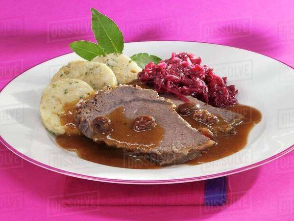 Sauerbraten (pot roast) with red cabbage & napkin dumplings - Royalty ...