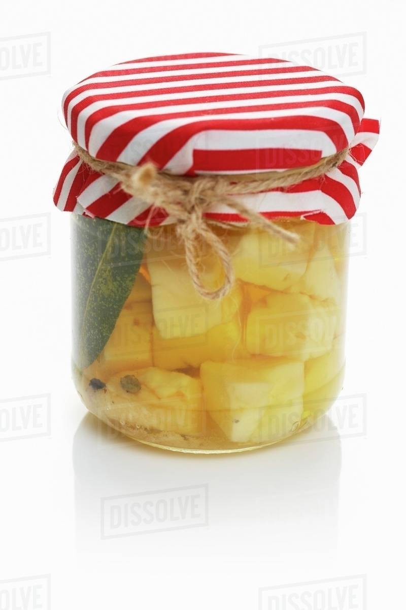 Pickled sheep's cheese in a jar - Royalty-free Stock Photo | Dissolve