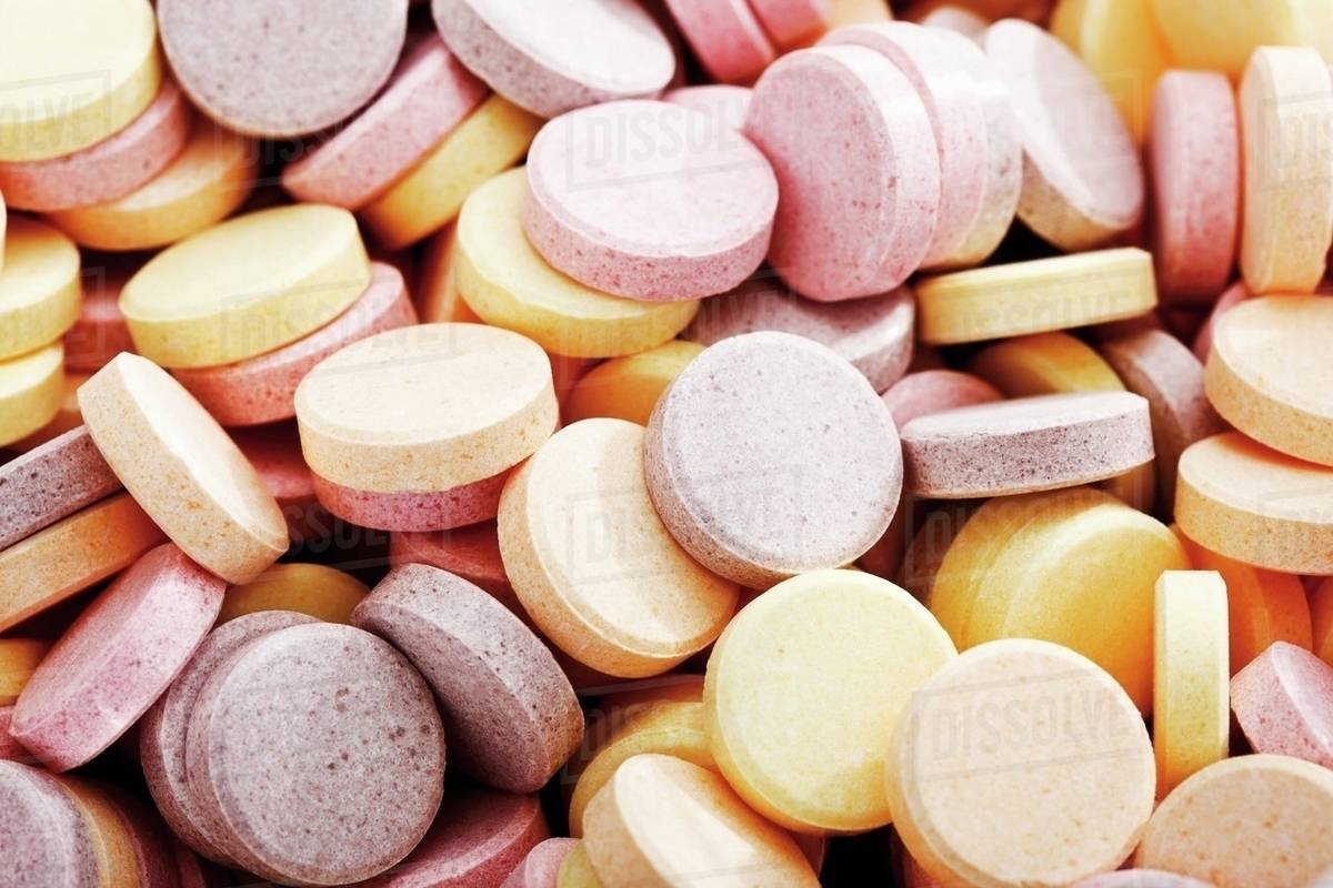 Coloured glucose tablets (full-frame) - Royalty-free Stock Photo | Dissolve