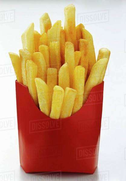 French Fries in Red Fast Food Container - Stock Photo - Dissolve