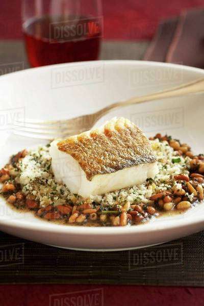 Baked Cod over Beans - Stock Photo - Dissolve