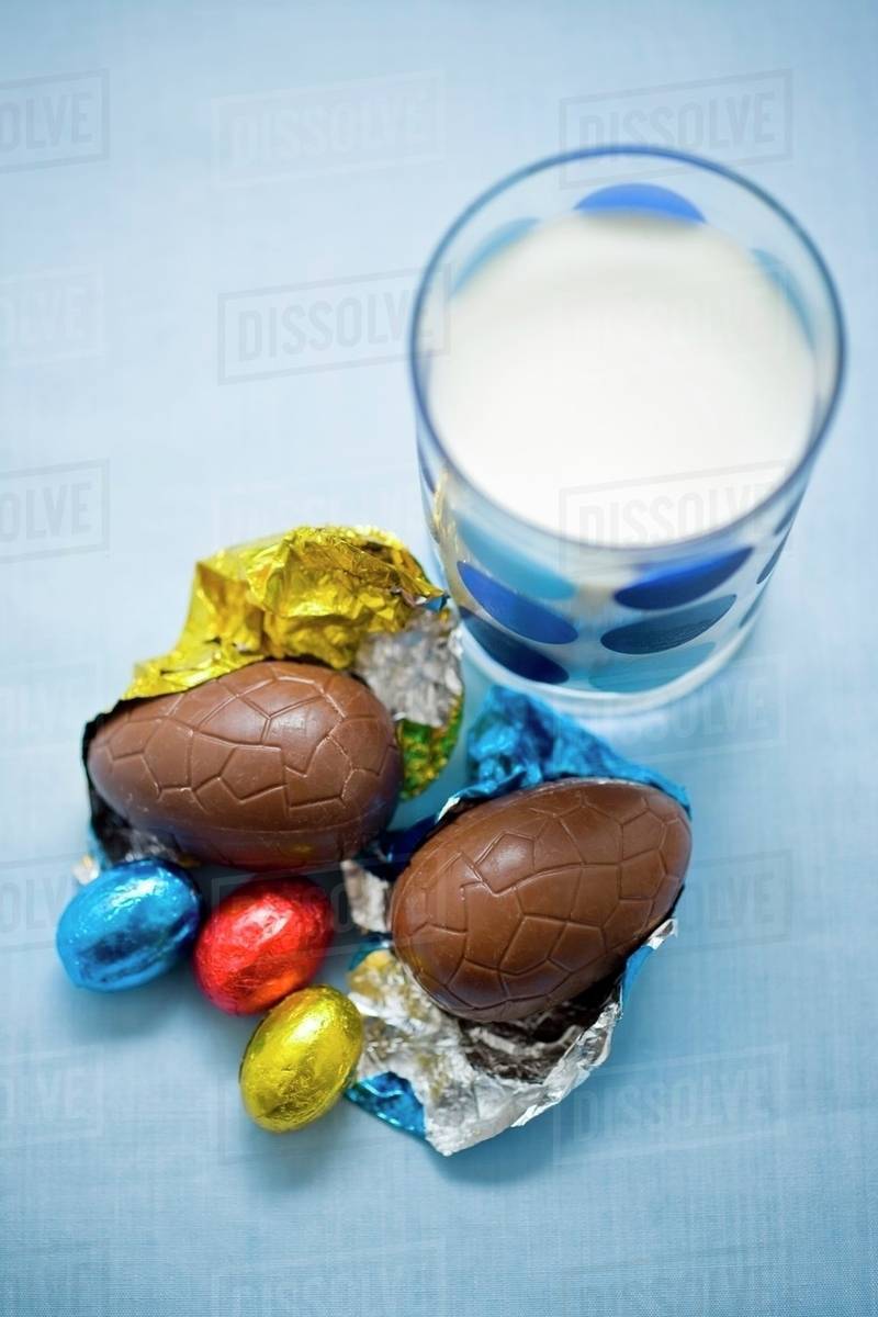 Chocolate Easter eggs and glass of milk - Royalty-free Stock Photo ...