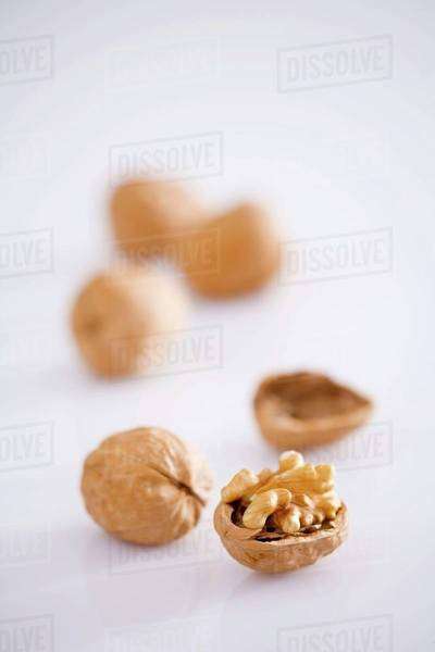 Walnuts, unshelled and shelled - Royalty-free Stock Photo | Dissolve