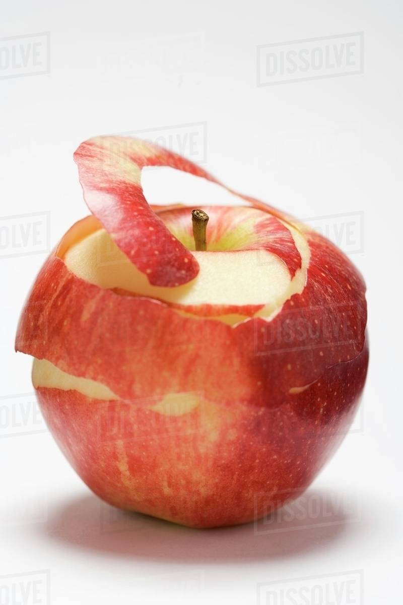 Gala apple, partly peeled - Royalty-free Stock Photo | Dissolve