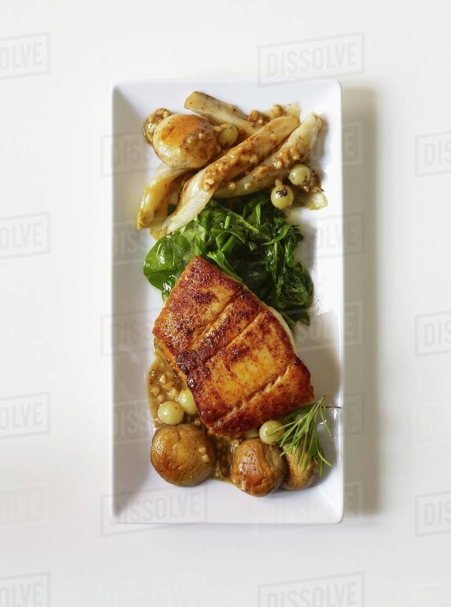 Pan Fried Fish with Veggies on a White Rectangular Dish - Royalty-free ...