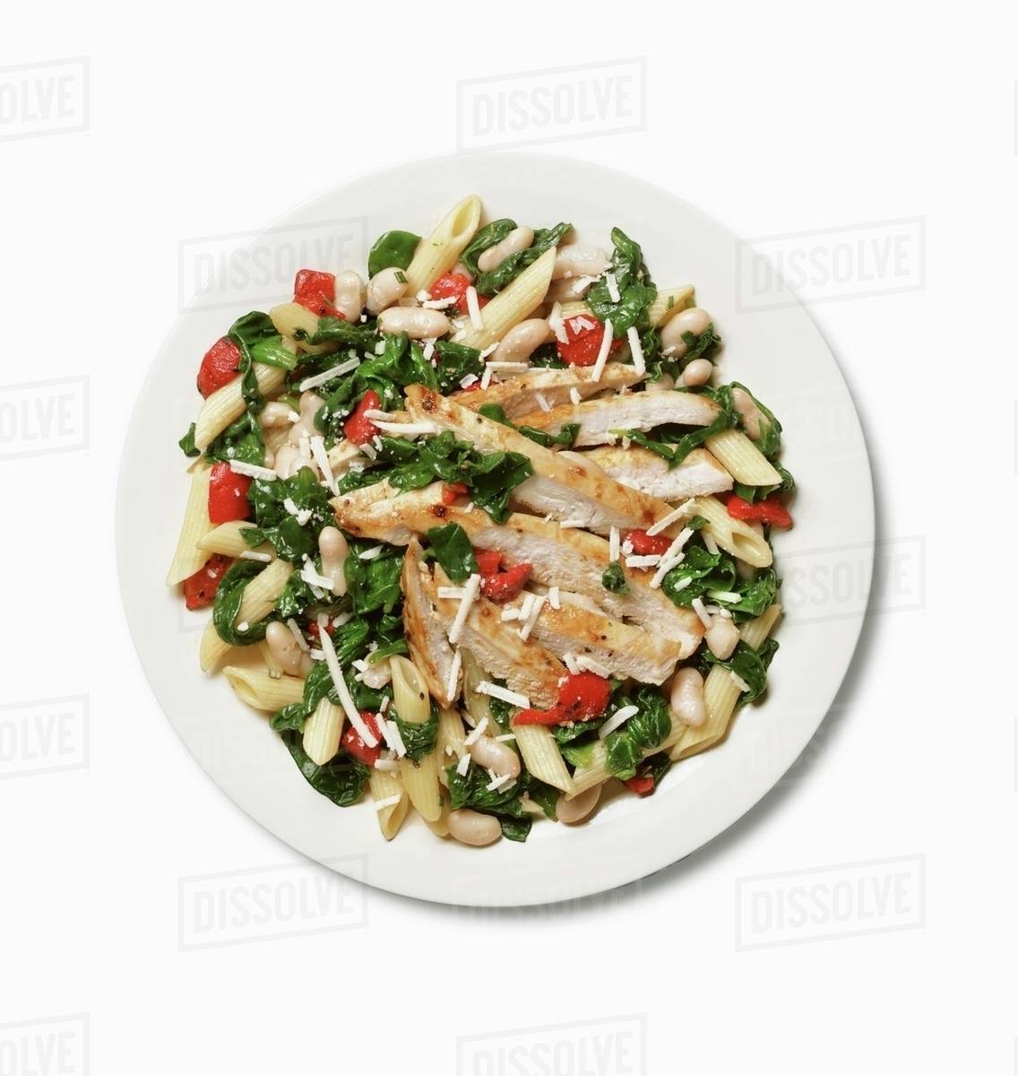 Tuscan Chicken Dish with Pasta and White Beans - Royalty-free Stock ...