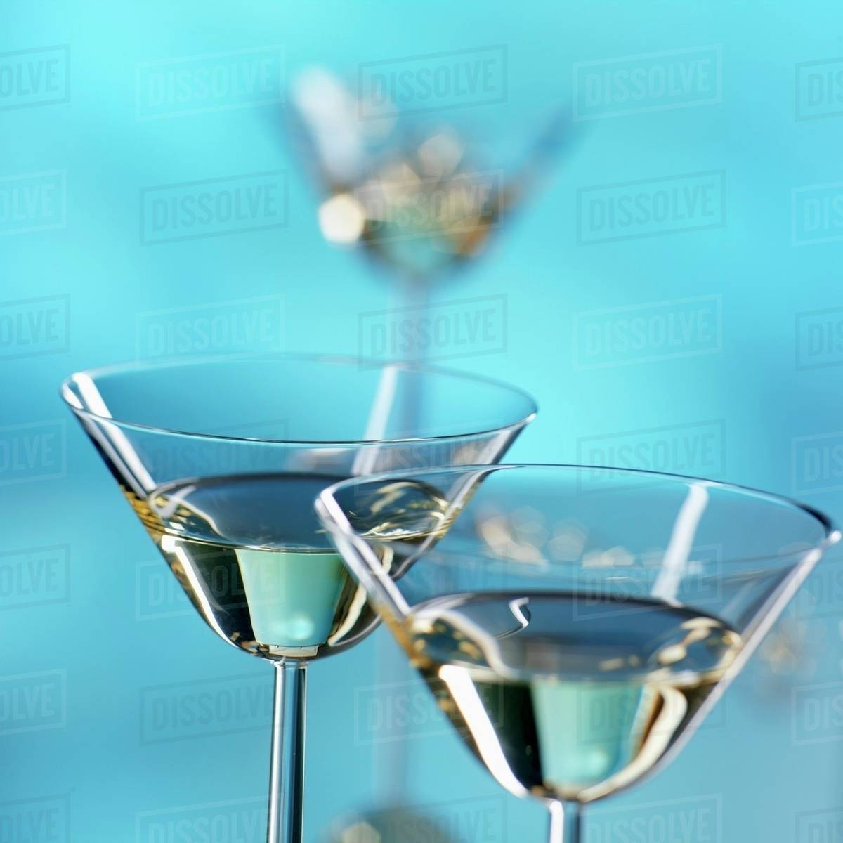 Martini in blue light - Royalty-free Stock Photo | Dissolve
