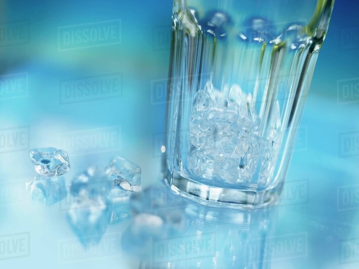 Crushed ice in and beside tumbler - Royalty-free Stock Photo | Dissolve