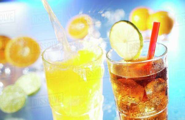 Refreshing drinks with ice cubes - Royalty-free Stock Photo | Dissolve