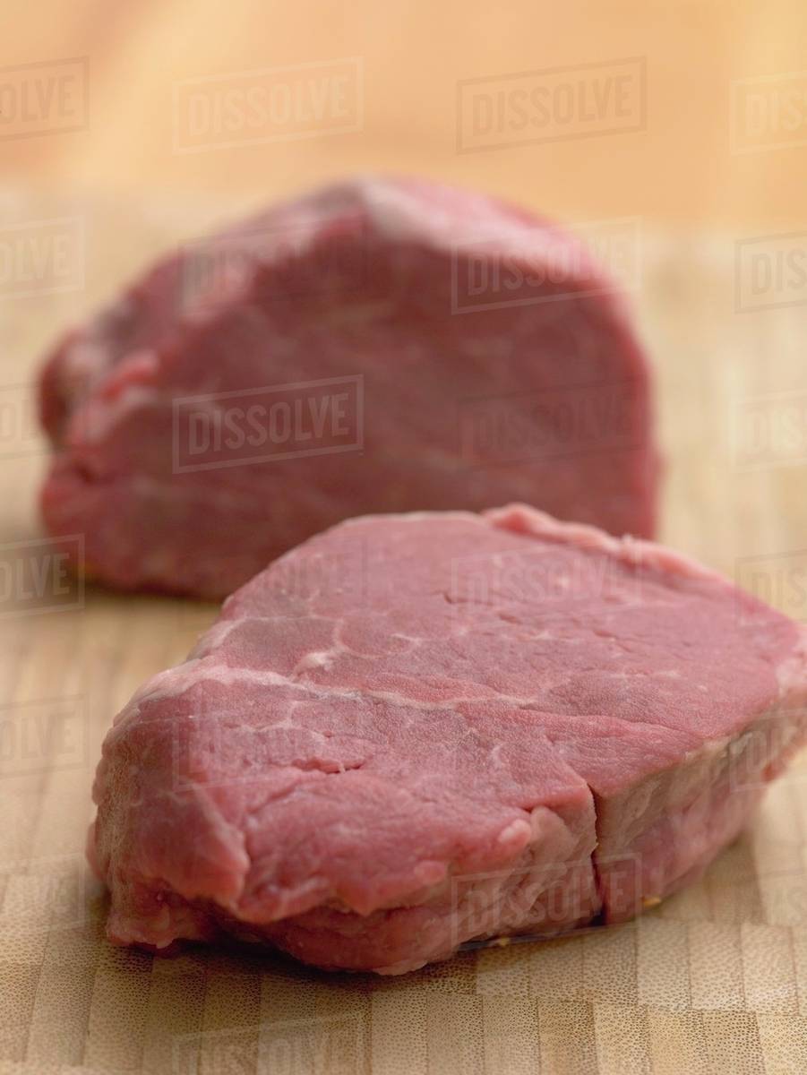Two beef medallions - Royalty-free Stock Photo | Dissolve