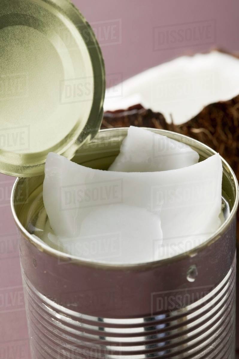 Coconut flesh in a tin - Stock Photo - Dissolve