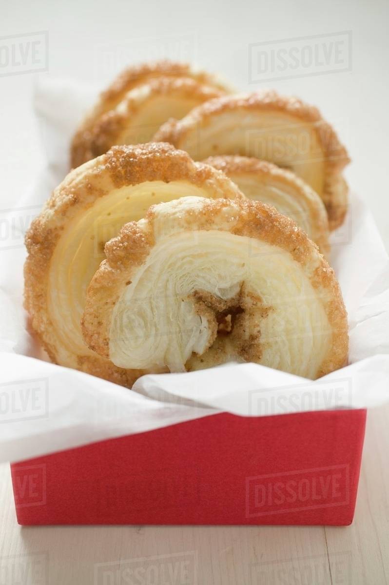 Palmiers (puff pastry biscuits) in red box - Royalty-free Stock Photo ...