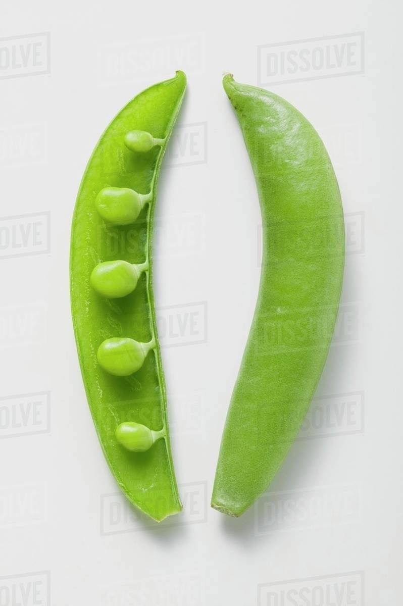 Whole pea pod and half a pea pod - Royalty-free Stock Photo | Dissolve