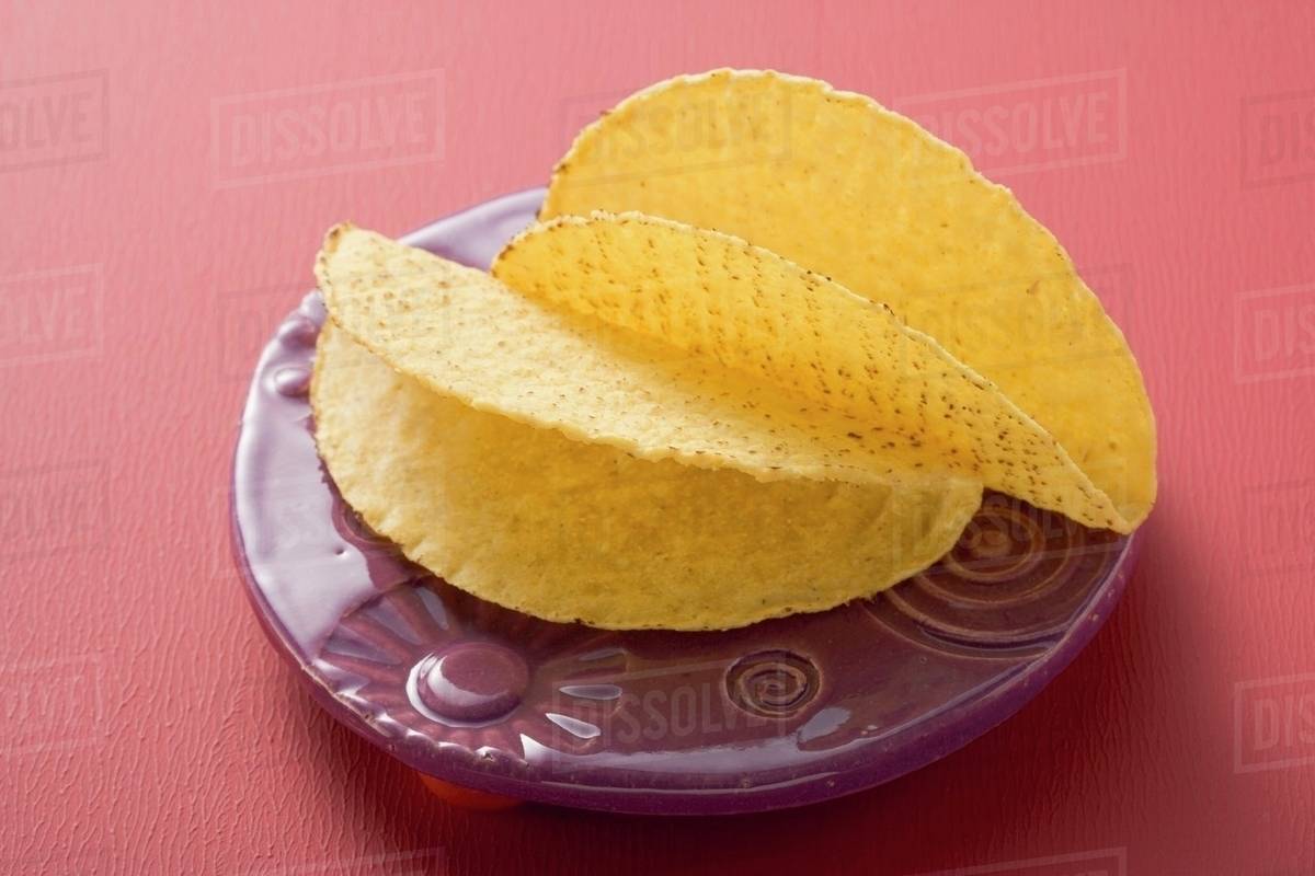 Two taco shells on Mexican plate - Royalty-free Stock Photo | Dissolve