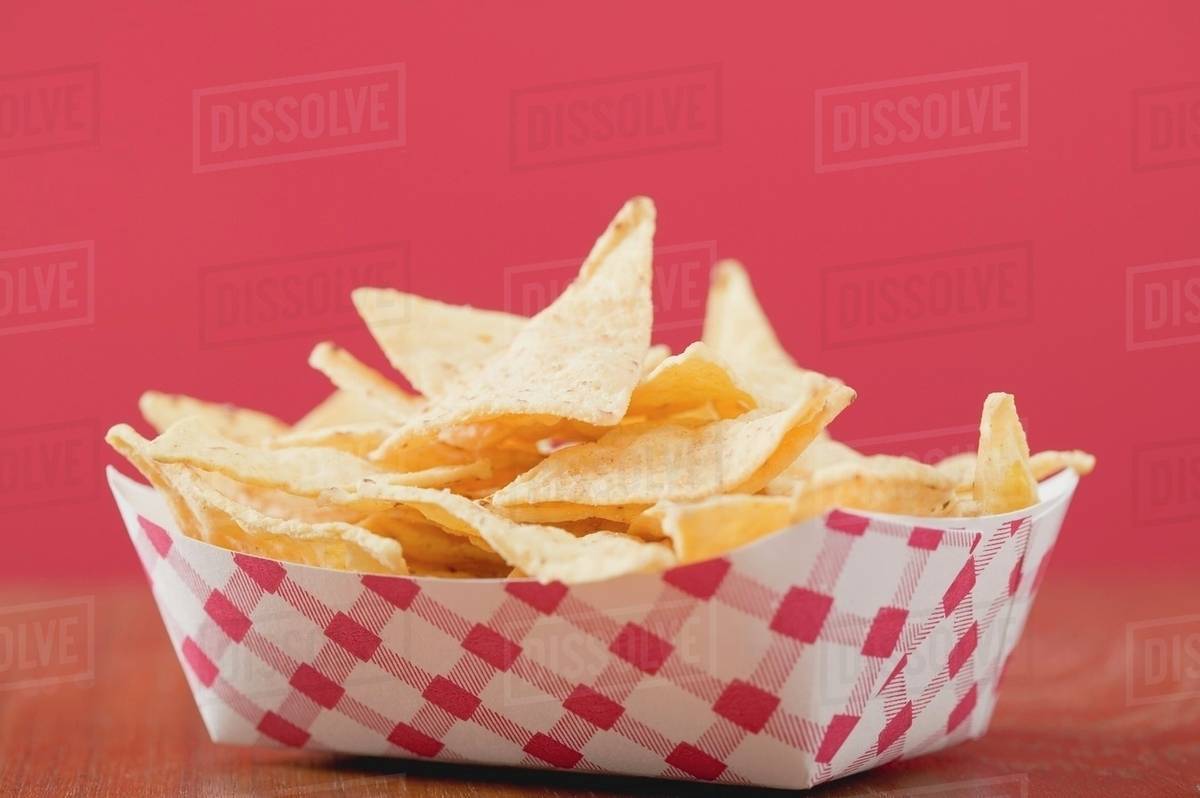 Nachos in cardboard container - Royalty-free Stock Photo | Dissolve